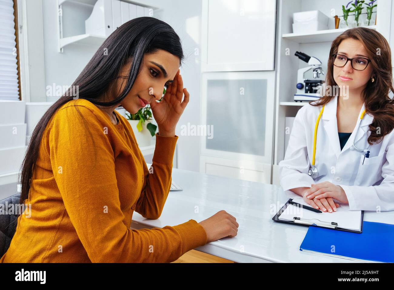 Talking doctor patient emotion hi-res stock photography and images - Alamy