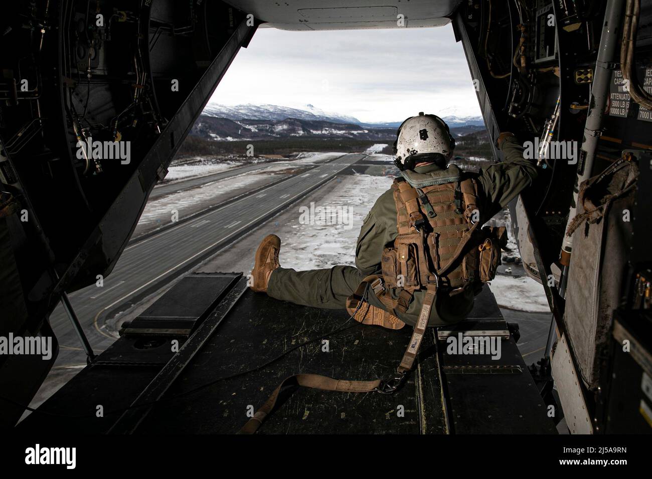 U.S. Marine Corps Cpl. Noah Guidry, an MV-22 crew chief assigned to the ...