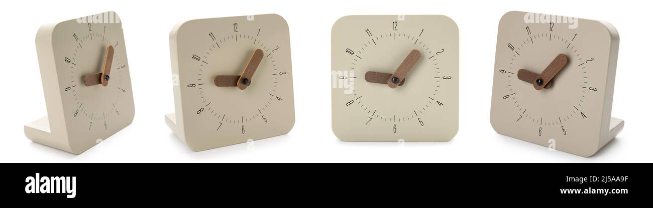 Modern clock on white background Stock Photo - Alamy