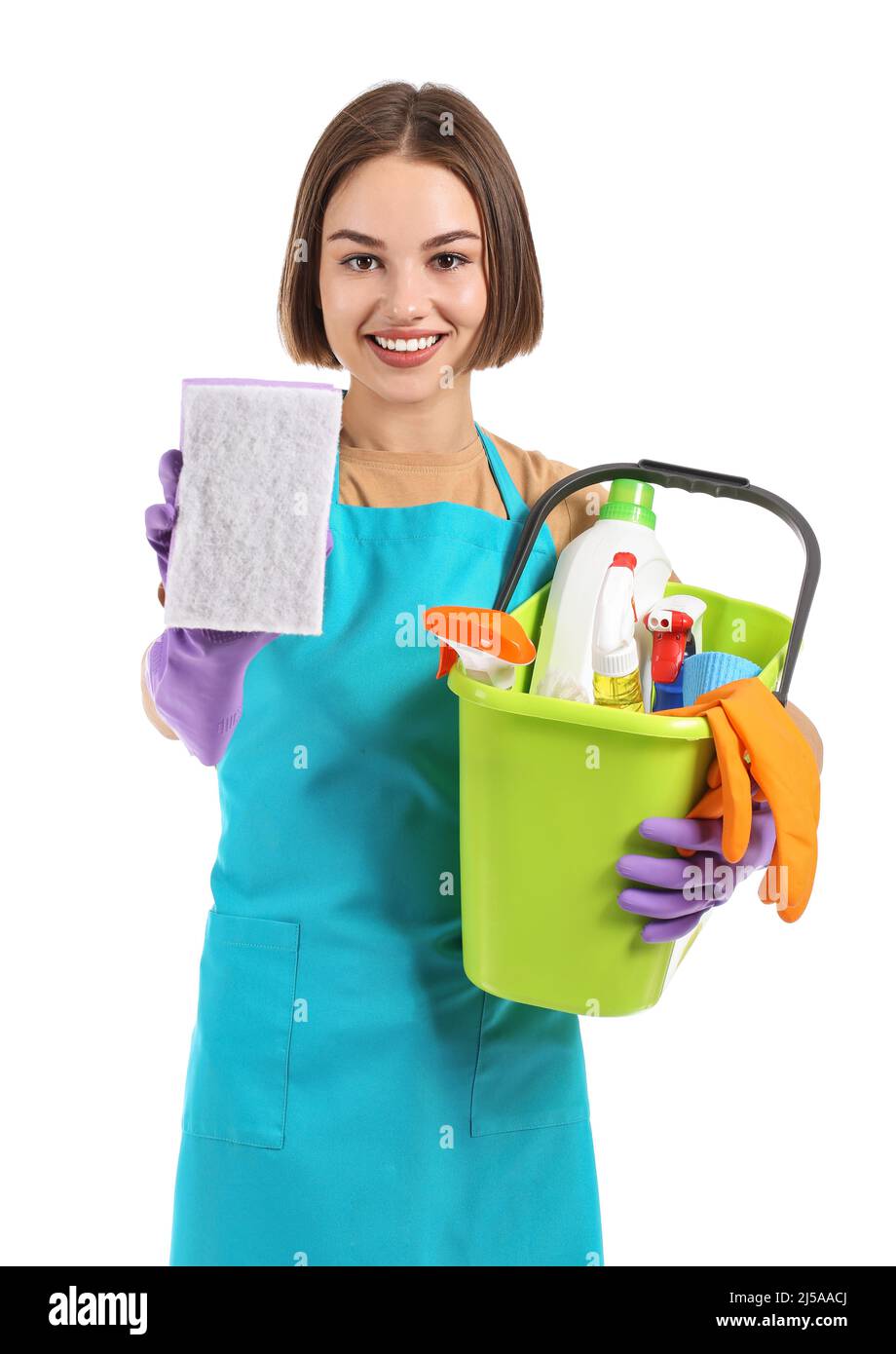 Beautiful young woman with cleaning supplies on white background Stock ...
