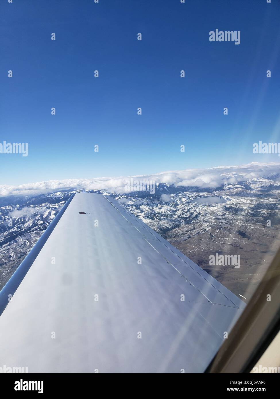 Airplane flying above high rocky hi-res stock photography and images ...