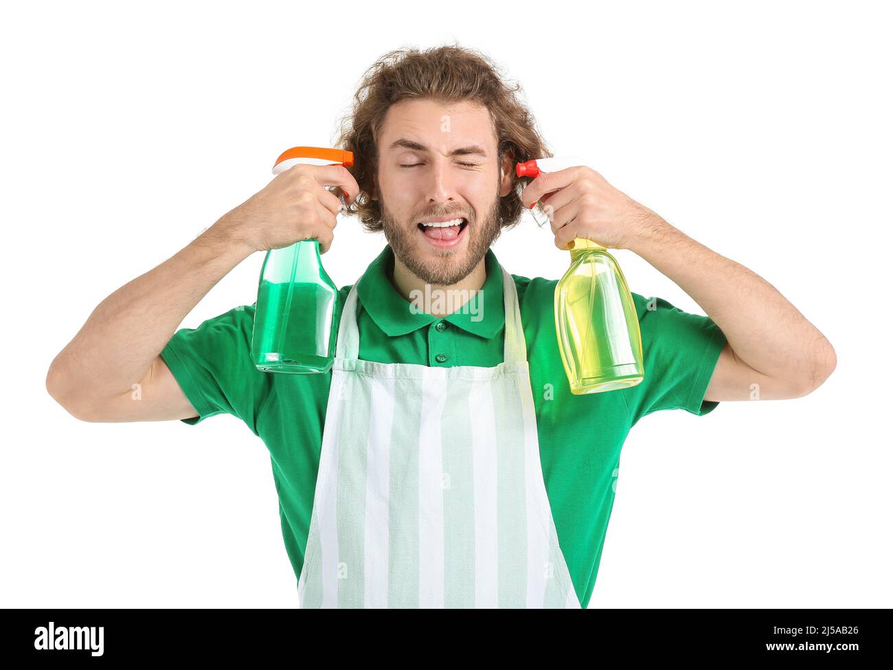 Funny worker of cleaning service with bottles of detergent on white ...