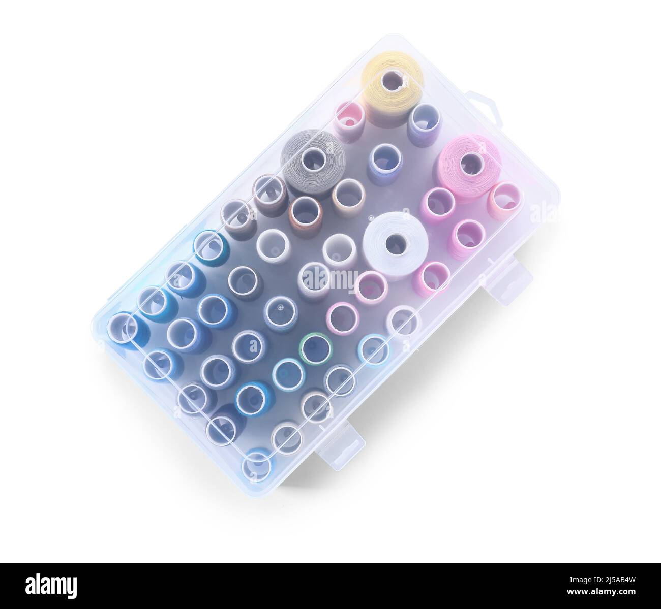 Plastic box with sewing threads on white background Stock Photo - Alamy