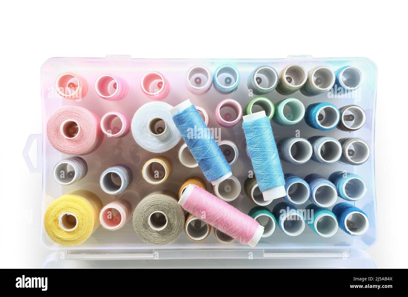 Plastic box with sewing threads on white background Stock Photo - Alamy Plastic box with sewing threads on white background Stock Photo - Alamy