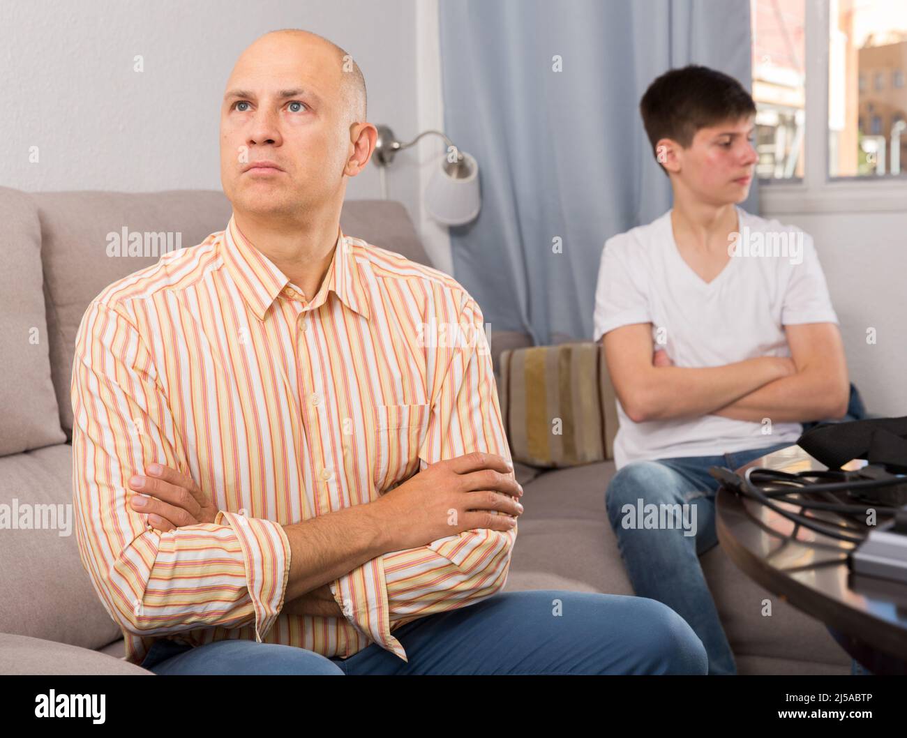 Offended father after quarrel Stock Photo - Alamy