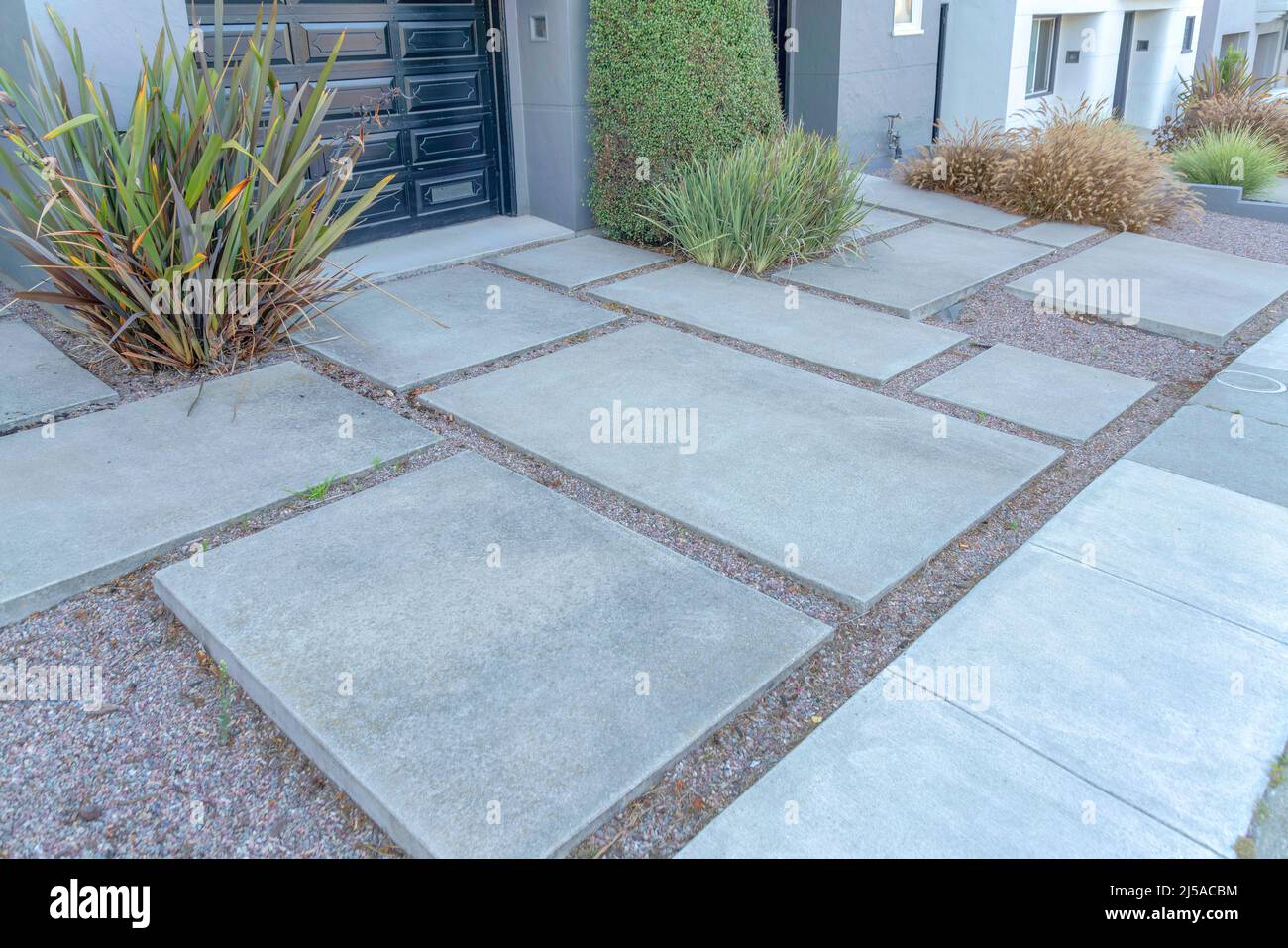 Staggered concrete pavers outside the house at San Francisco ...
