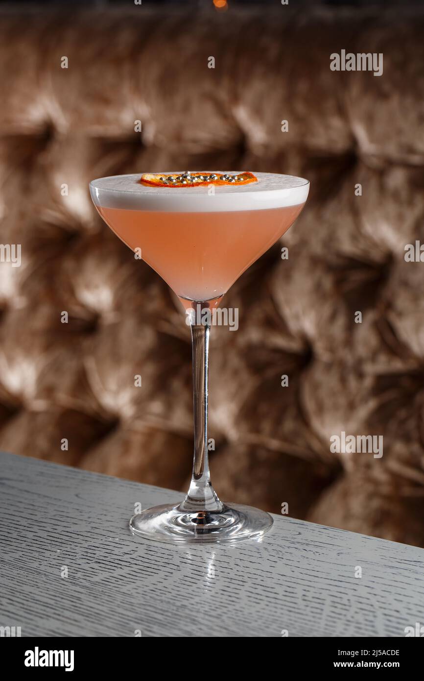 Orange Clover Club Cocktail in Coupe Glass with Layer of Foam and ...