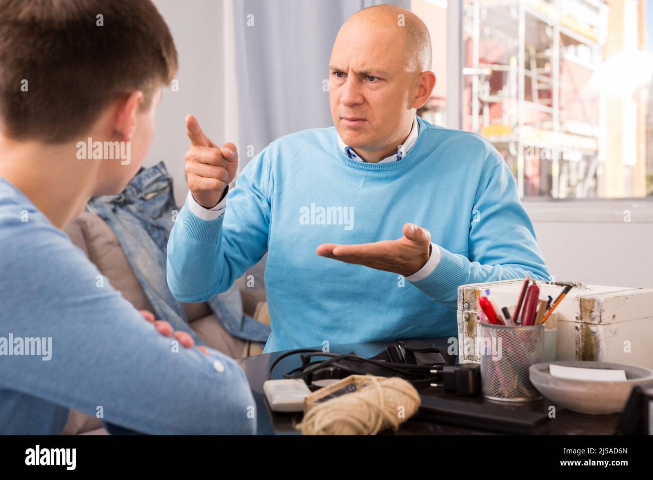 Father lecturing son hi-res stock photography and images - Alamy