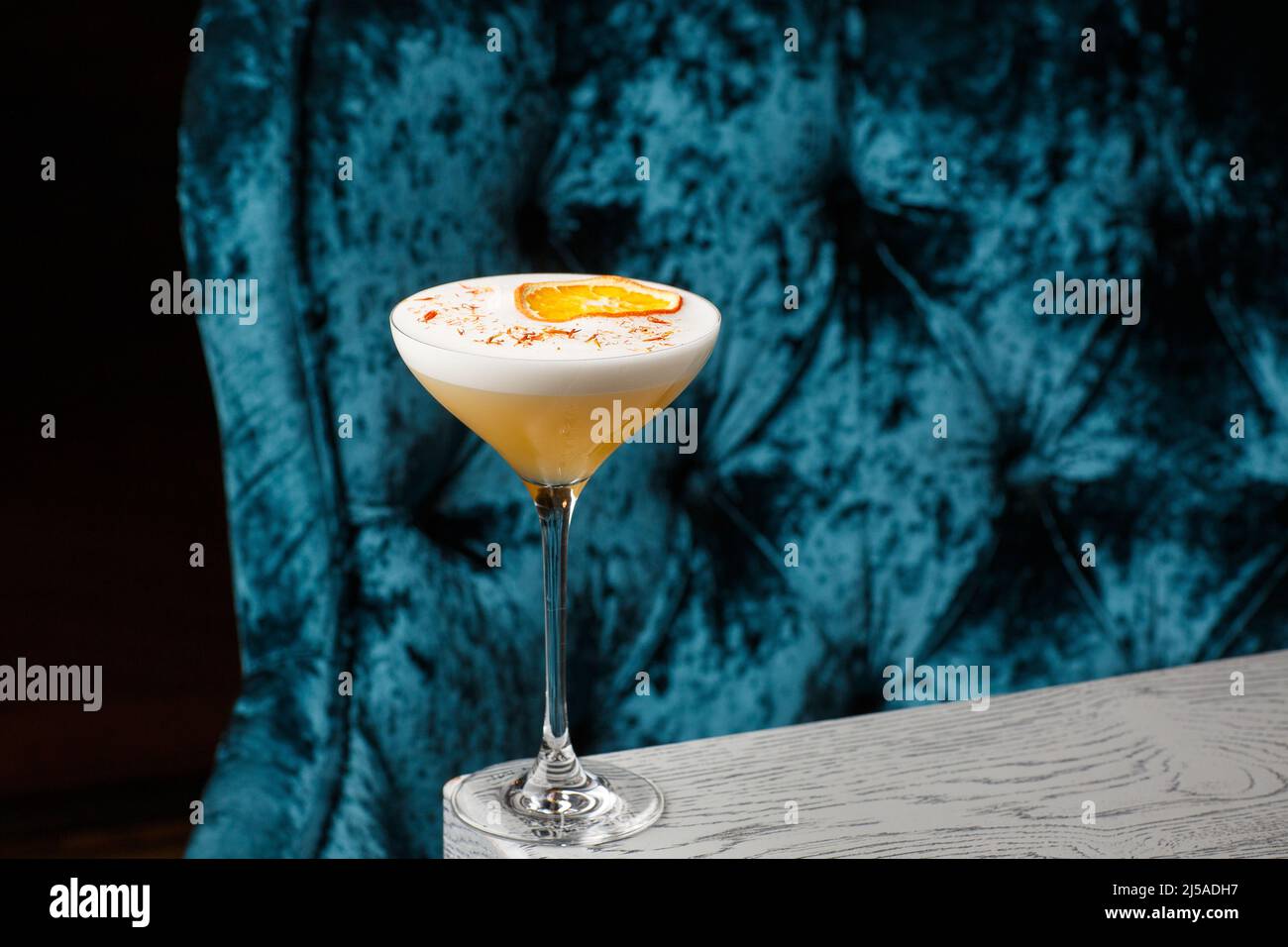 Homemade Pisco sour cocktail. Whiskey Sour in Coupe Glass with ice on ...