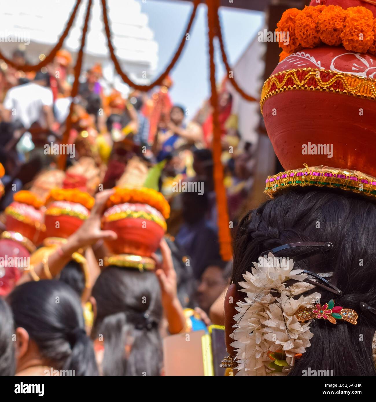 Women with Kalash on head during Jagannath Temple Mangal Kalash Yatra ...