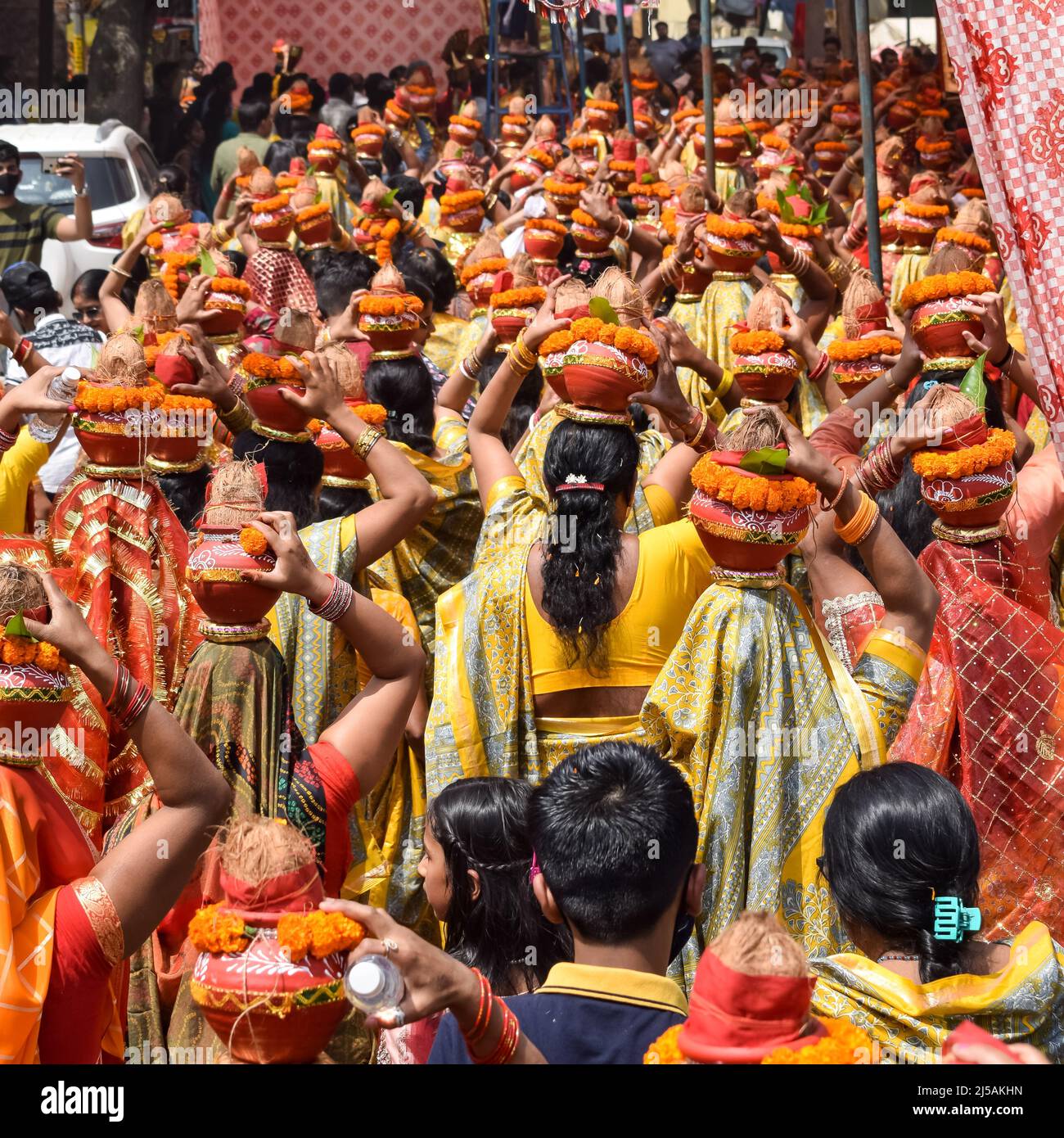 Women with Kalash on head during Jagannath Temple Mangal Kalash Yatra ...