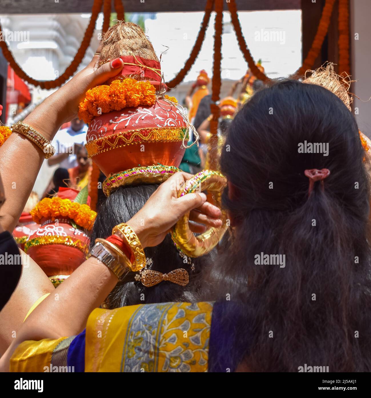 Women with Kalash on head during Jagannath Temple Mangal Kalash Yatra ...