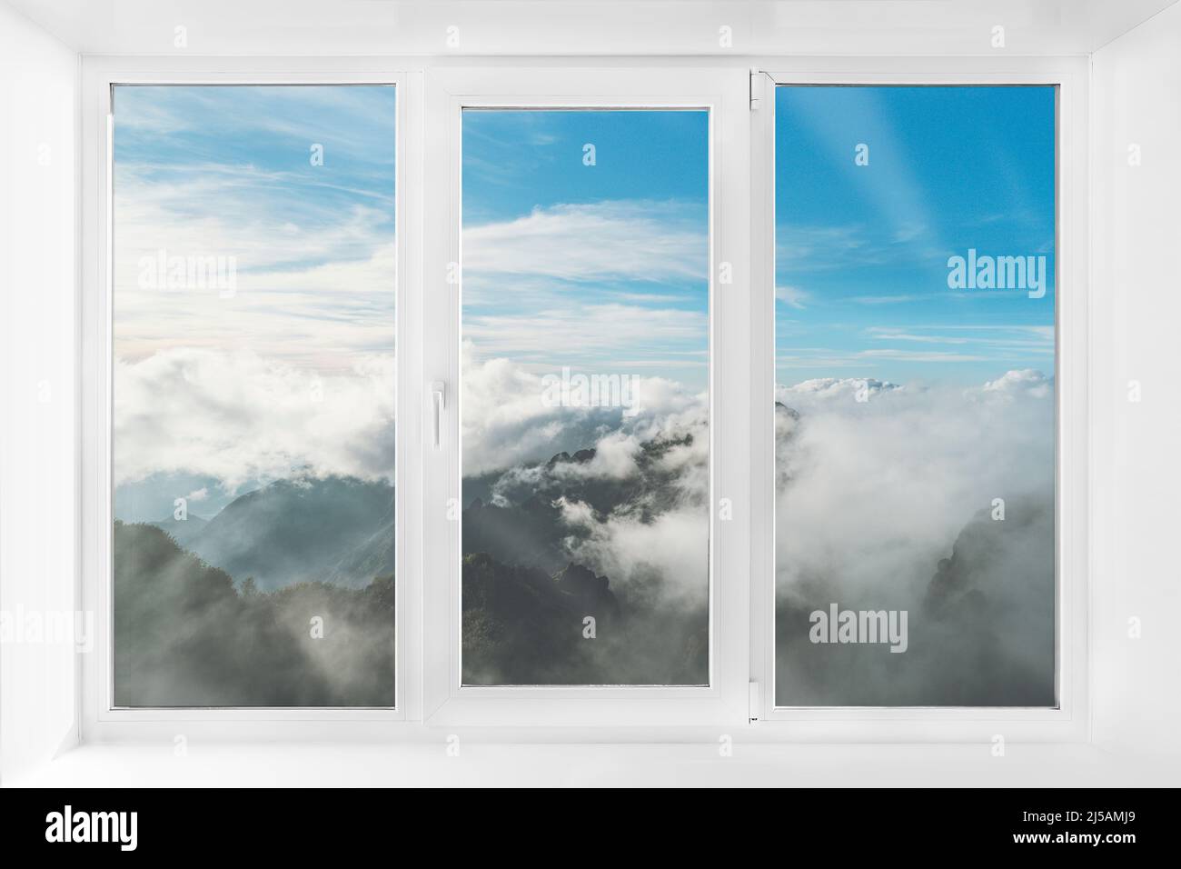 Inside view of the trapezoid-shaped attic window - idyllic landscape ...