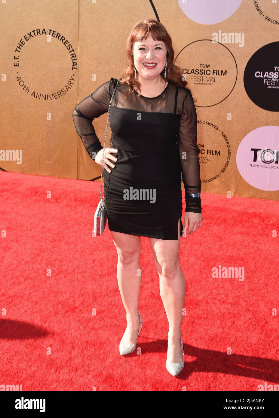 Aileen Quinn walking on the red carpet at the 2022 TCM Classic Film ...