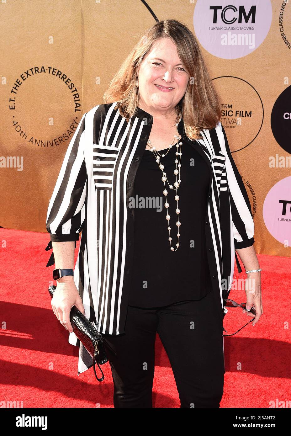 Megan Cavanagh walking on the red carpet at the 2022 TCM Classic Film ...