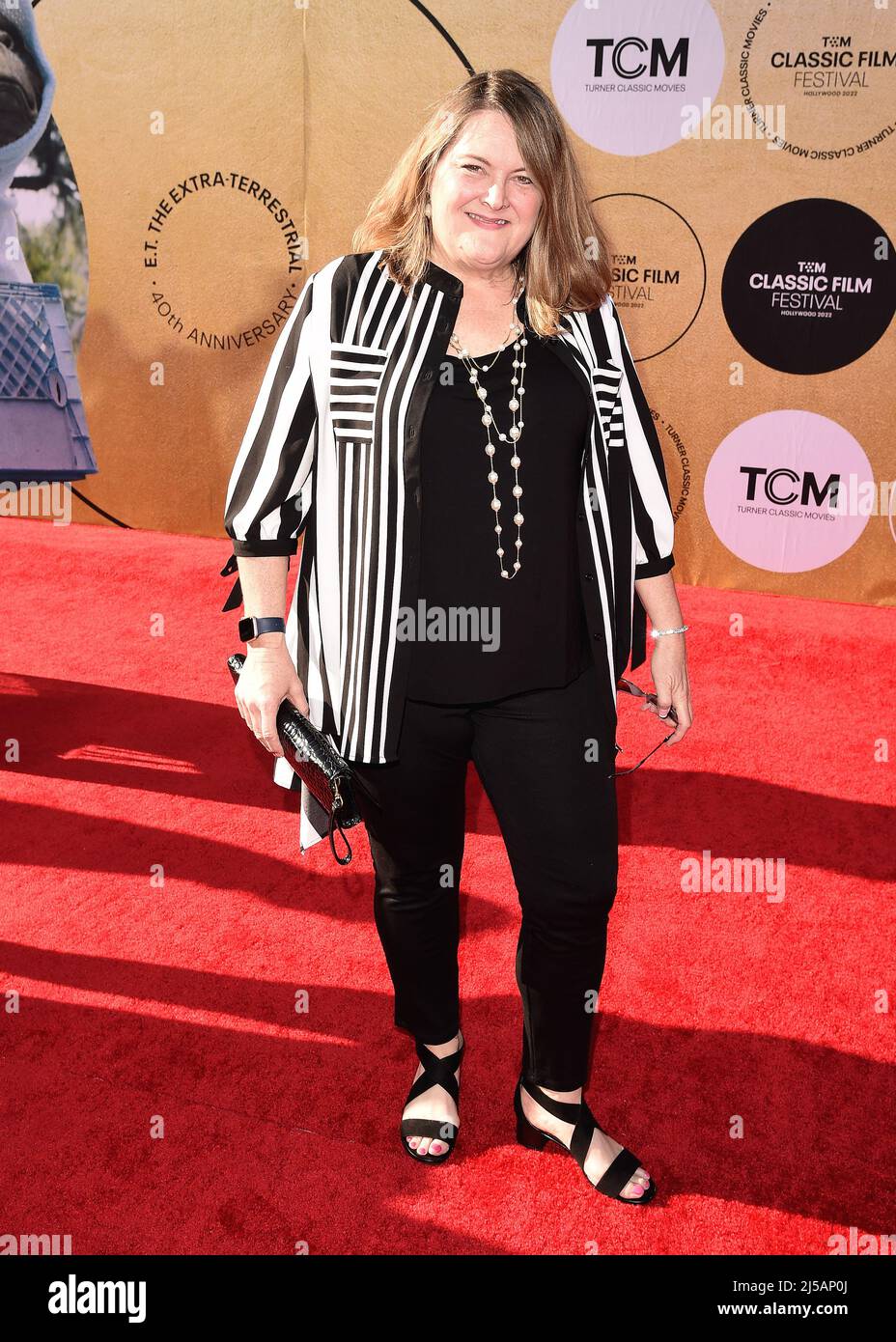 Megan Cavanagh walking on the red carpet at the 2022 TCM Classic Film ...