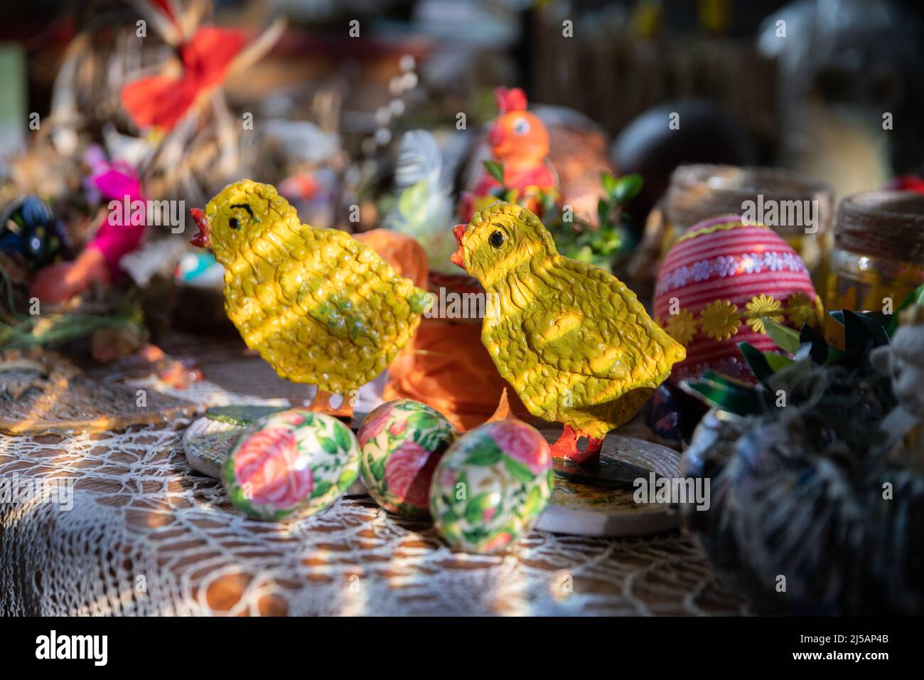 Yellow chickens and Easter eggs as decorations for Easter Stock Photo ...