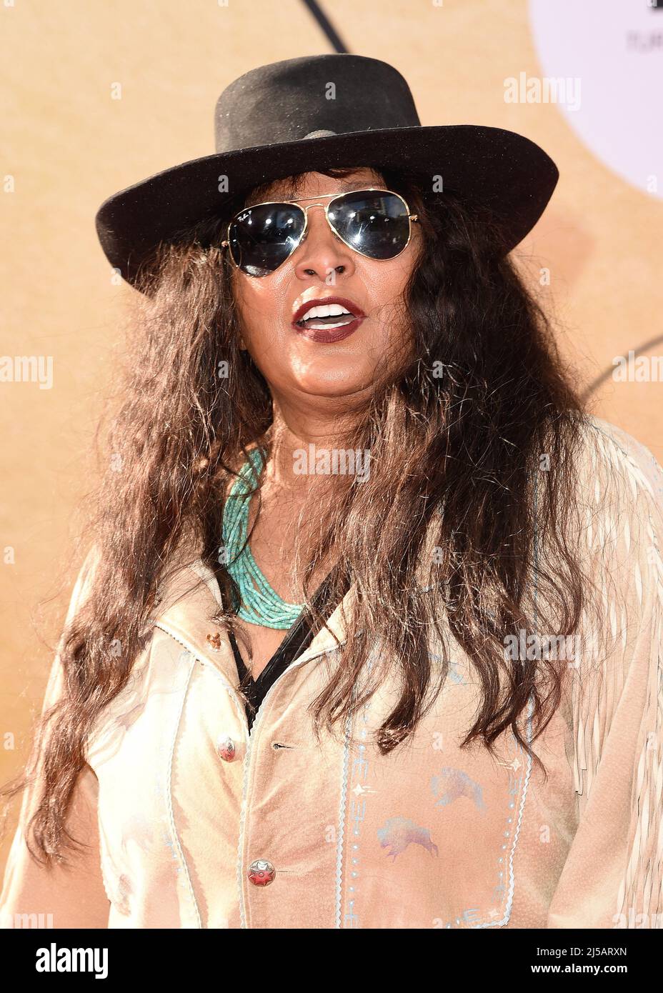 Pam Grier walking on the red carpet at the 2022 TCM Classic Film ...