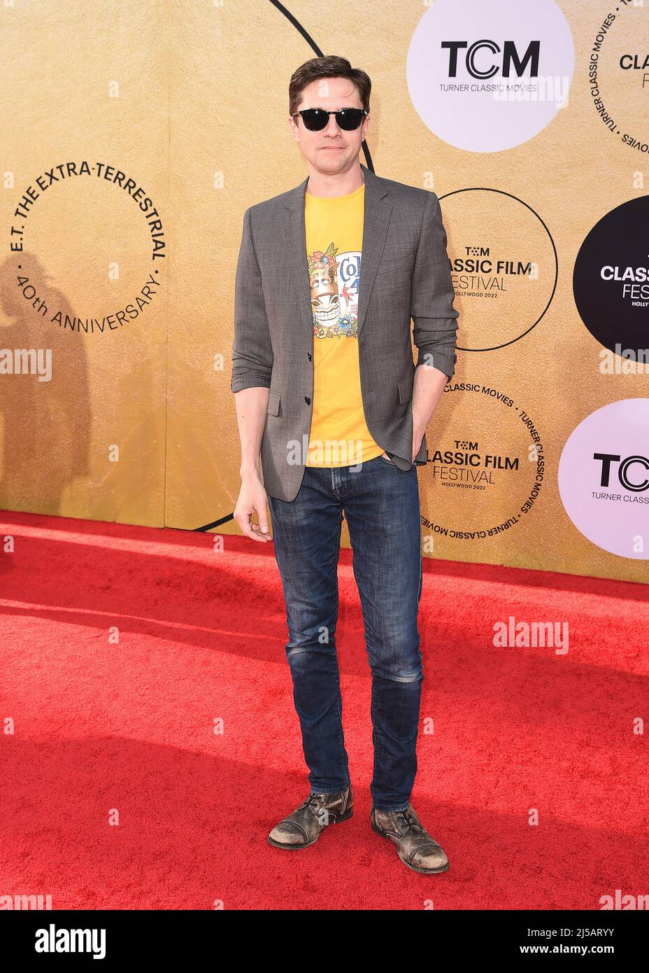 Topher Grace walking on the red carpet at the 2022 TCM Classic Film ...