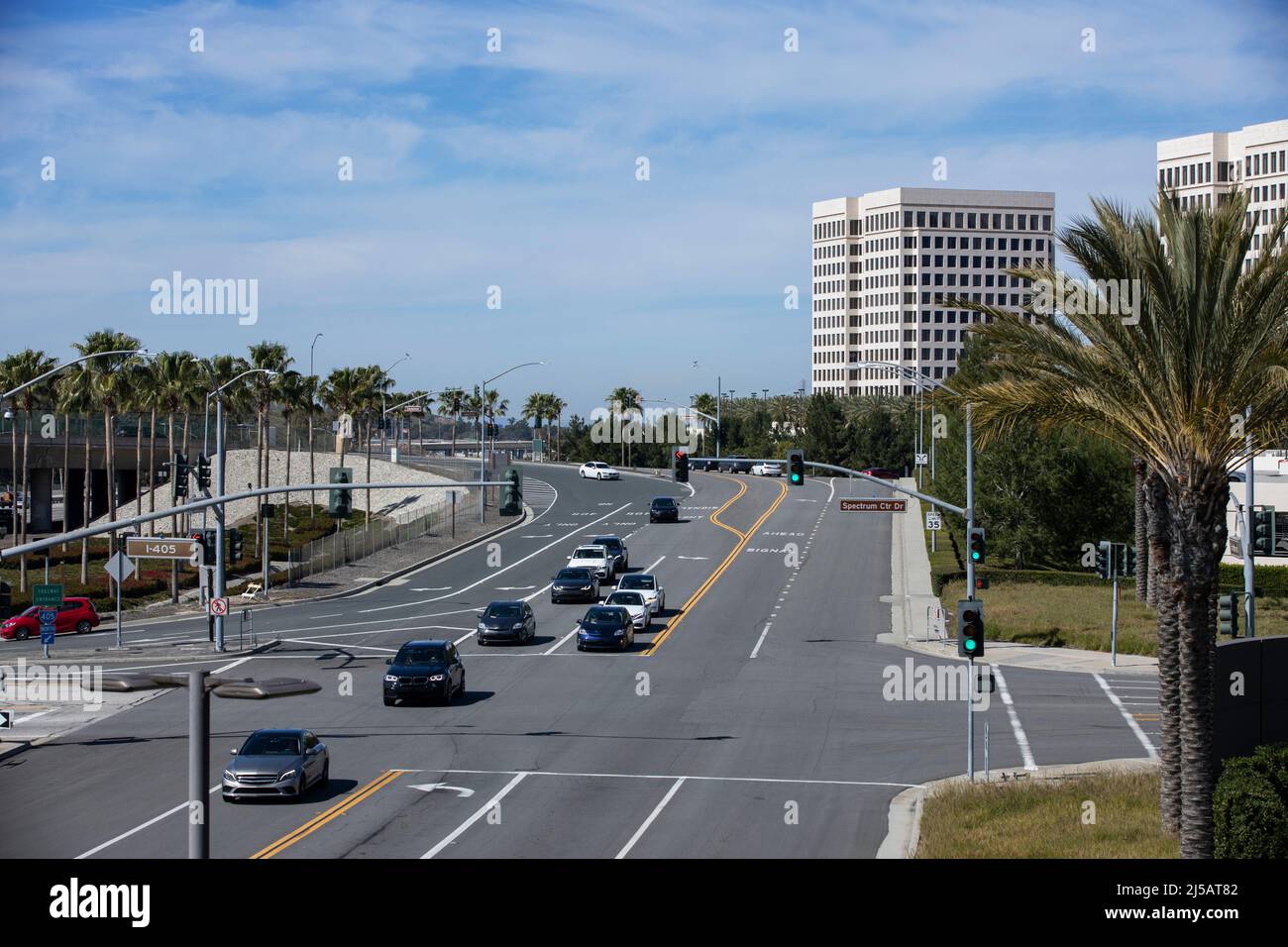 Daytime palm framed view of the Orange County downtown skyline of ...