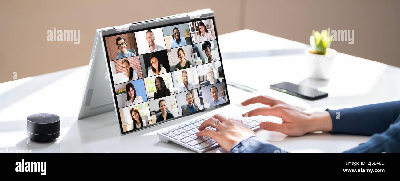 Virtual Conference Meeting In Office Room On Hybrid Convertible Laptop ...