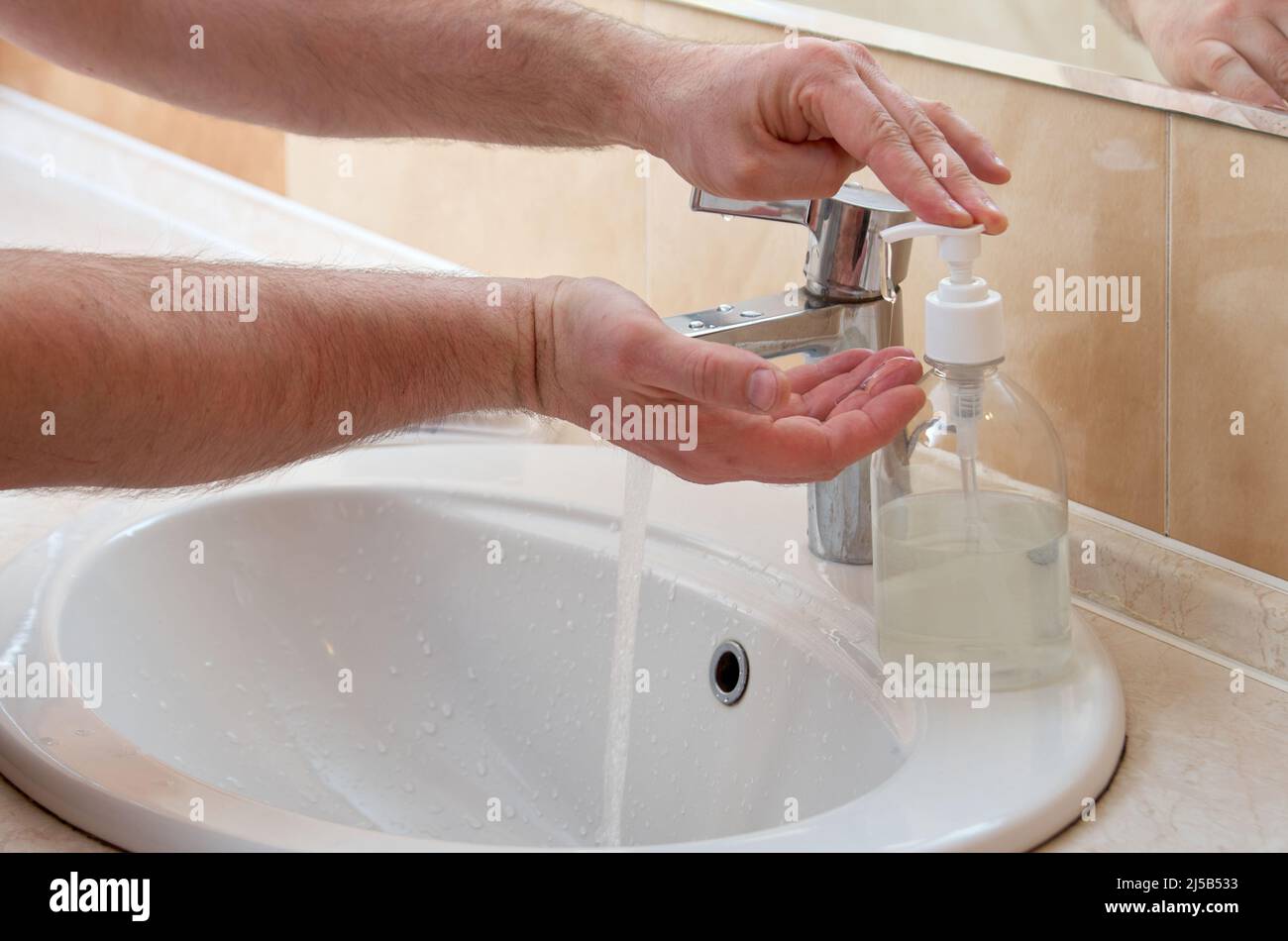 Washing hands rubbing with soap man for prevention and hygiene Stock ...
