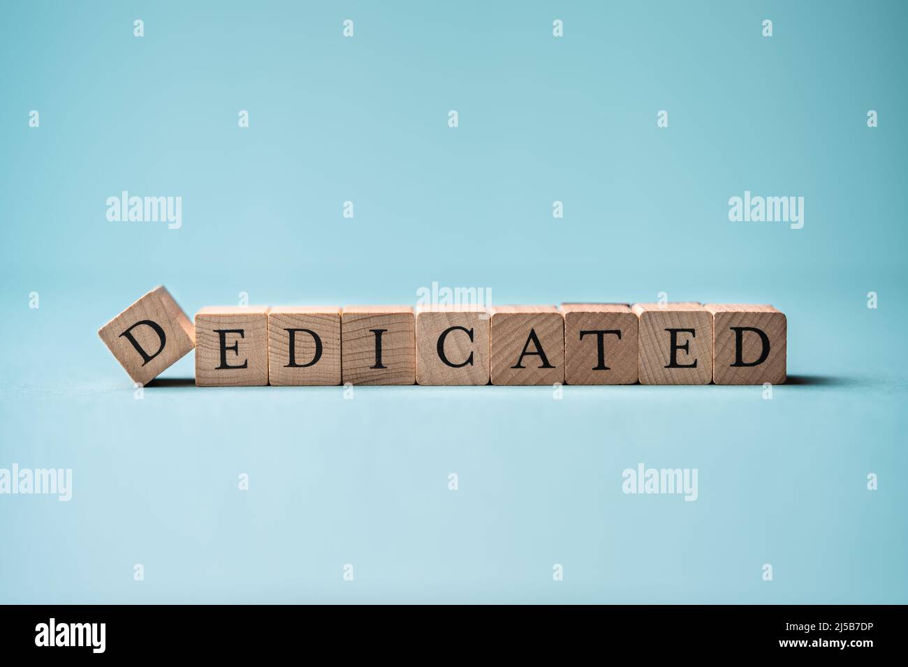 Devoted Dedicated Word Message. Loyalty Business Text Stock Photo - Alamy