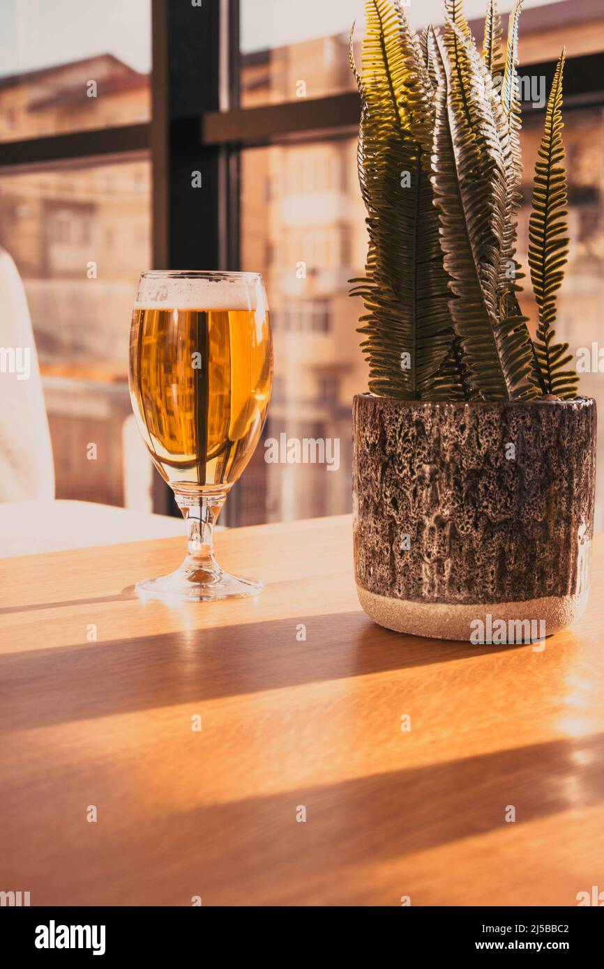 Glass of beer on a sunny table. Delicious Beer in Glass Stock Photo - Alamy