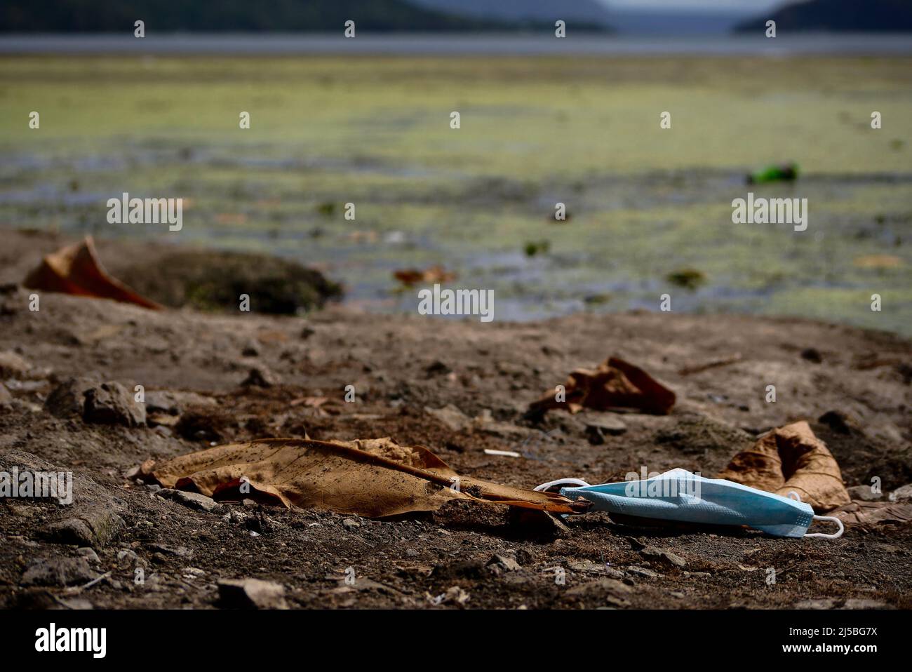Tanauan, Batangas, Philippines. 27th Mar, 2022. A surgical mask lying ...