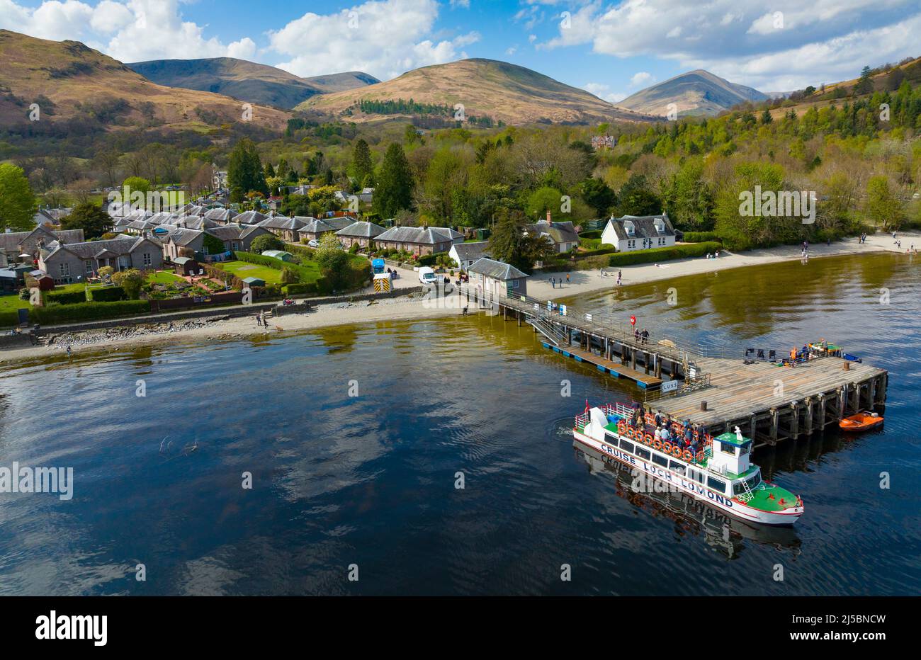 Aerial view from drone of tourist favourite village of Luss on beside ...