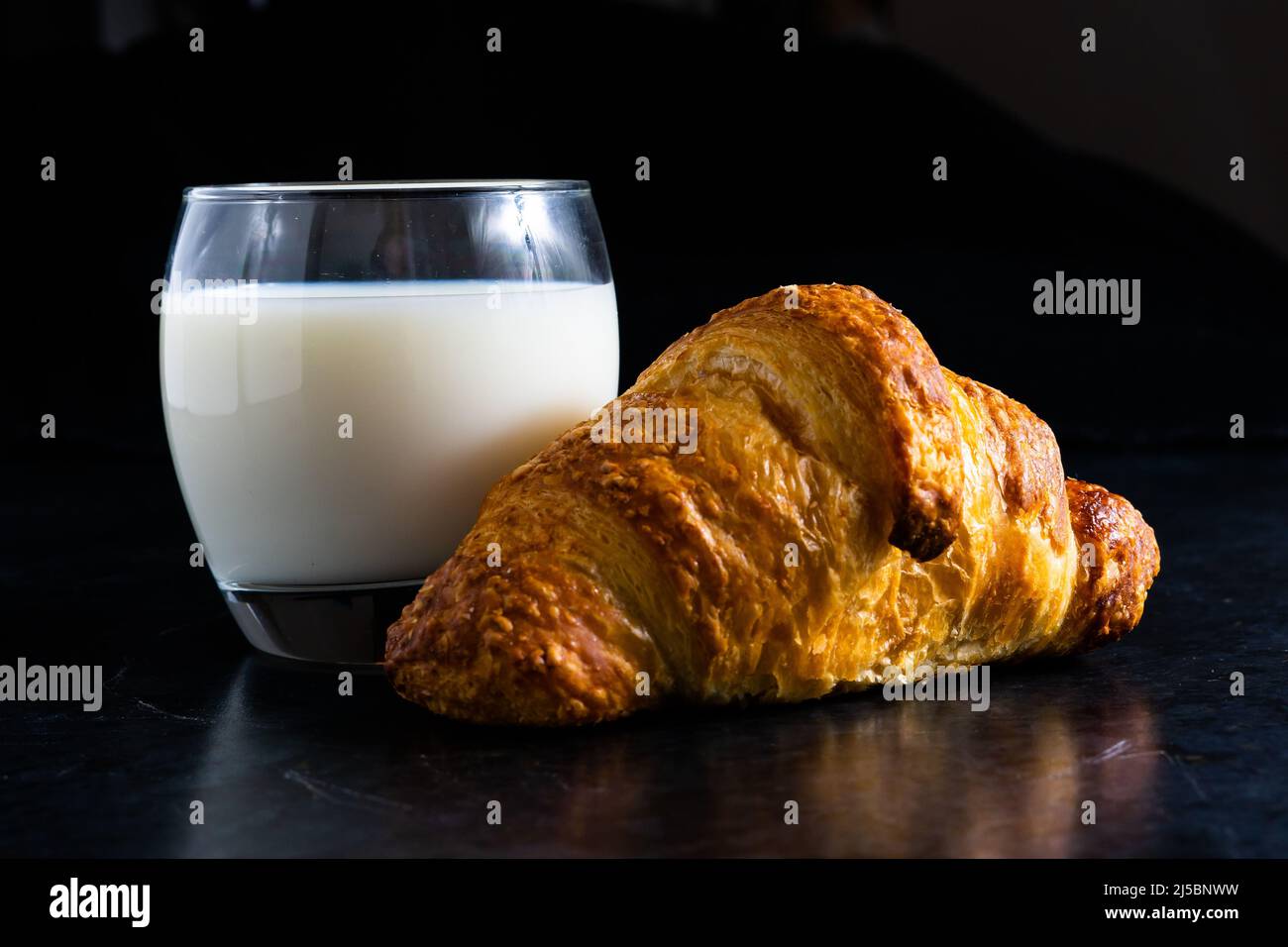 Sweet bread assorted traditional bakery, croissant, pans and a milk ...