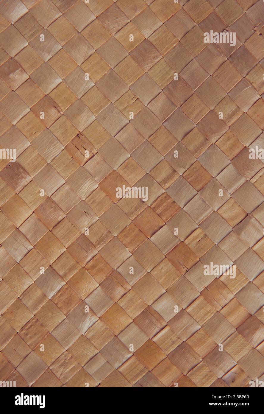 Brown braided reed texture. Closeup background Stock Photo - Alamy