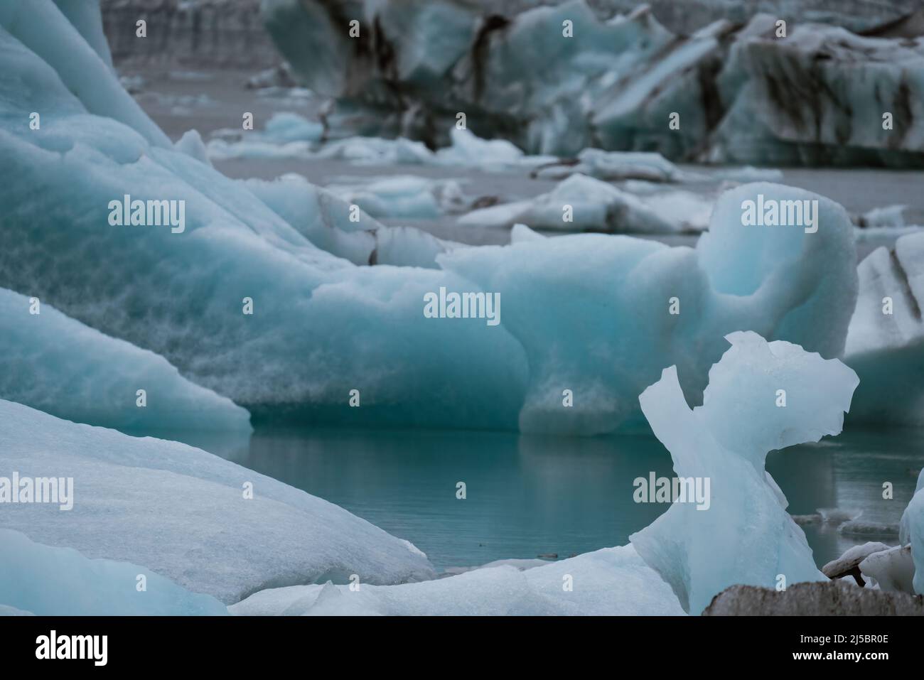 Boulder of ice screaming to the sky in the middle of the icebergs Stock ...