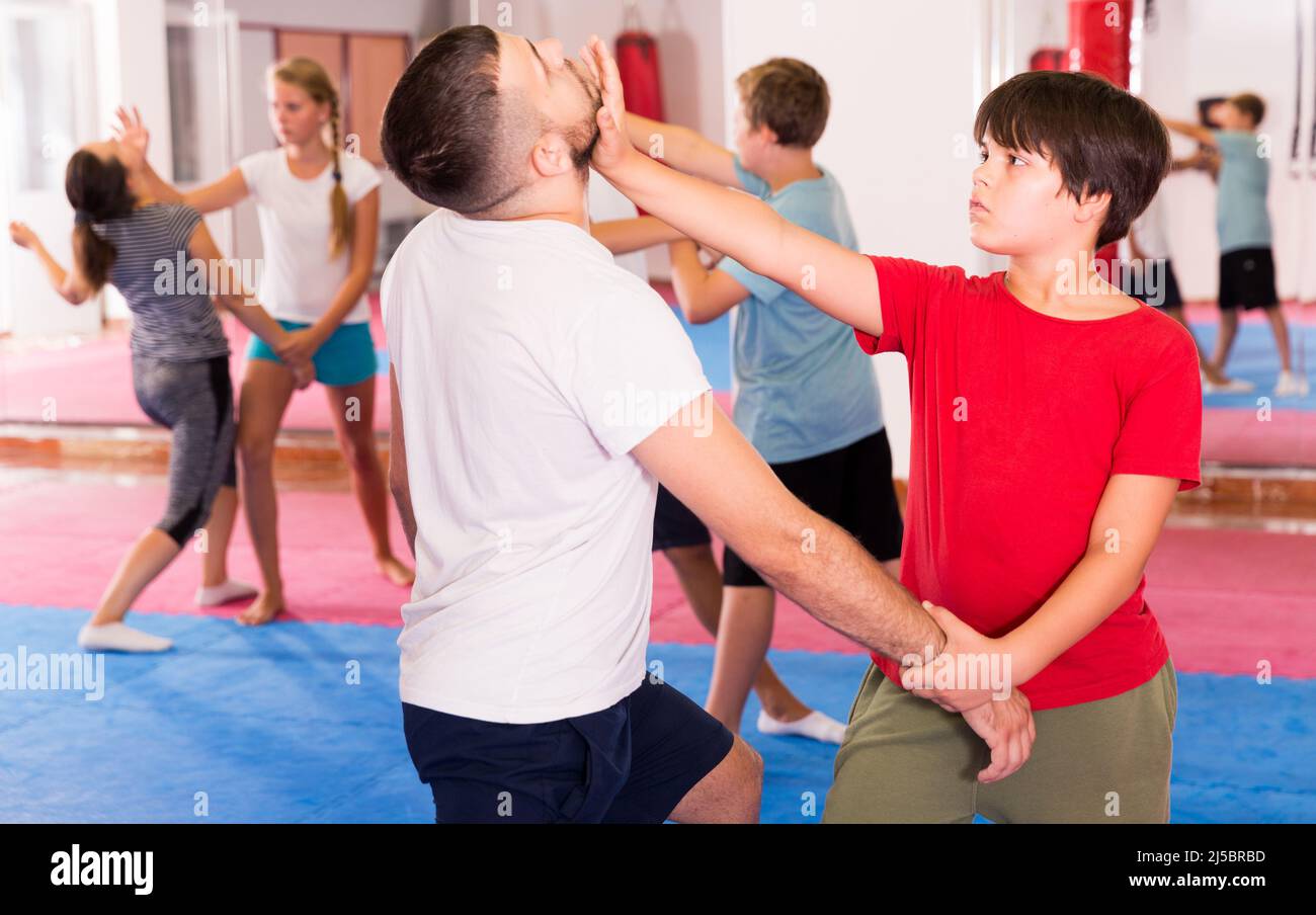 Kids exercising self-defense movements Stock Photo - Alamy