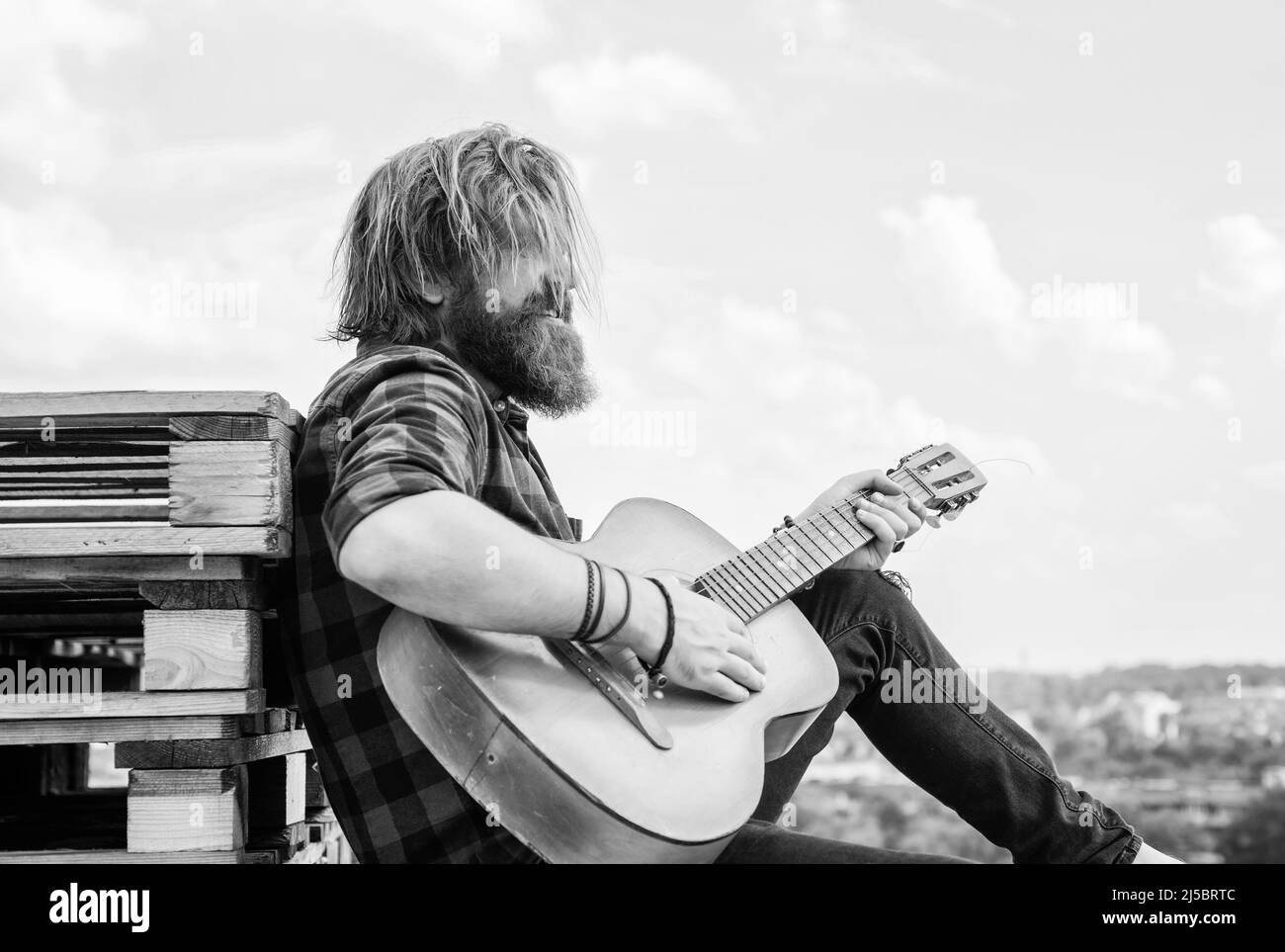 time to relax. bearded man in checkered shirt sing song. music ...