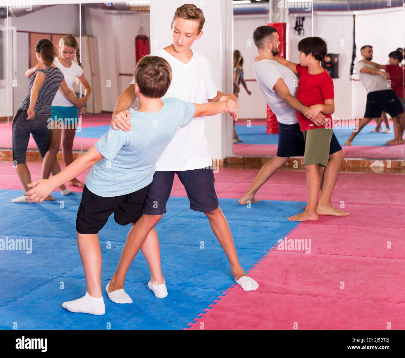 Kids exercising self-defense movements Stock Photo - Alamy