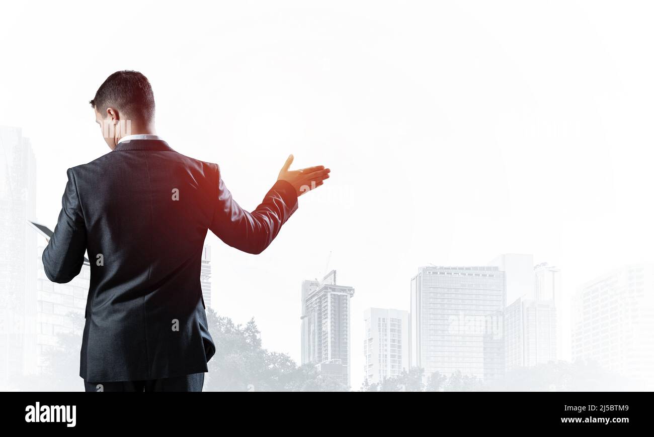 Back view of man in business suit and tie Stock Photo - Alamy