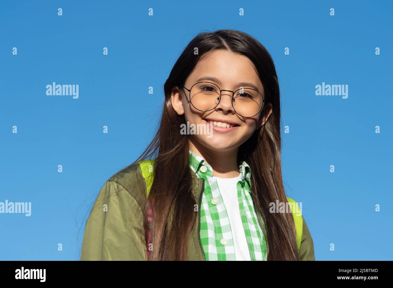 smiling kid with backpack wear glasses. back to school Stock Photo - Alamy