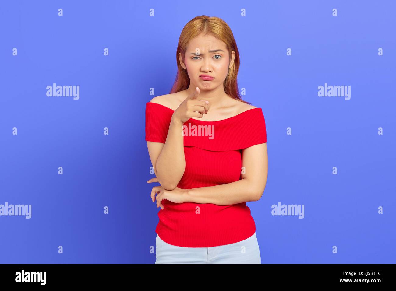 Teenage girl confused pointing hi-res stock photography and images - Alamy