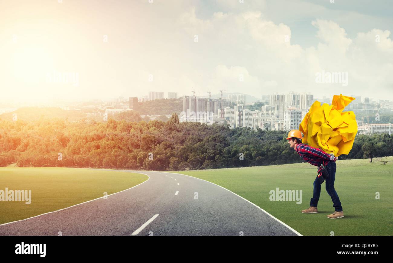 Engineer man carry load Stock Photo - Alamy