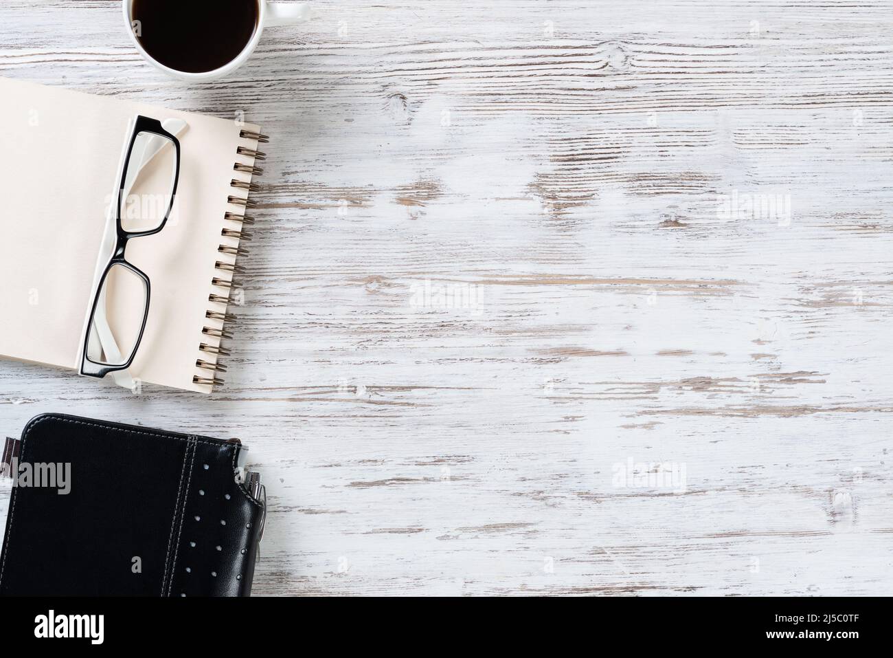 Top view office desk with white cup of coffee Stock Photo - Alamy