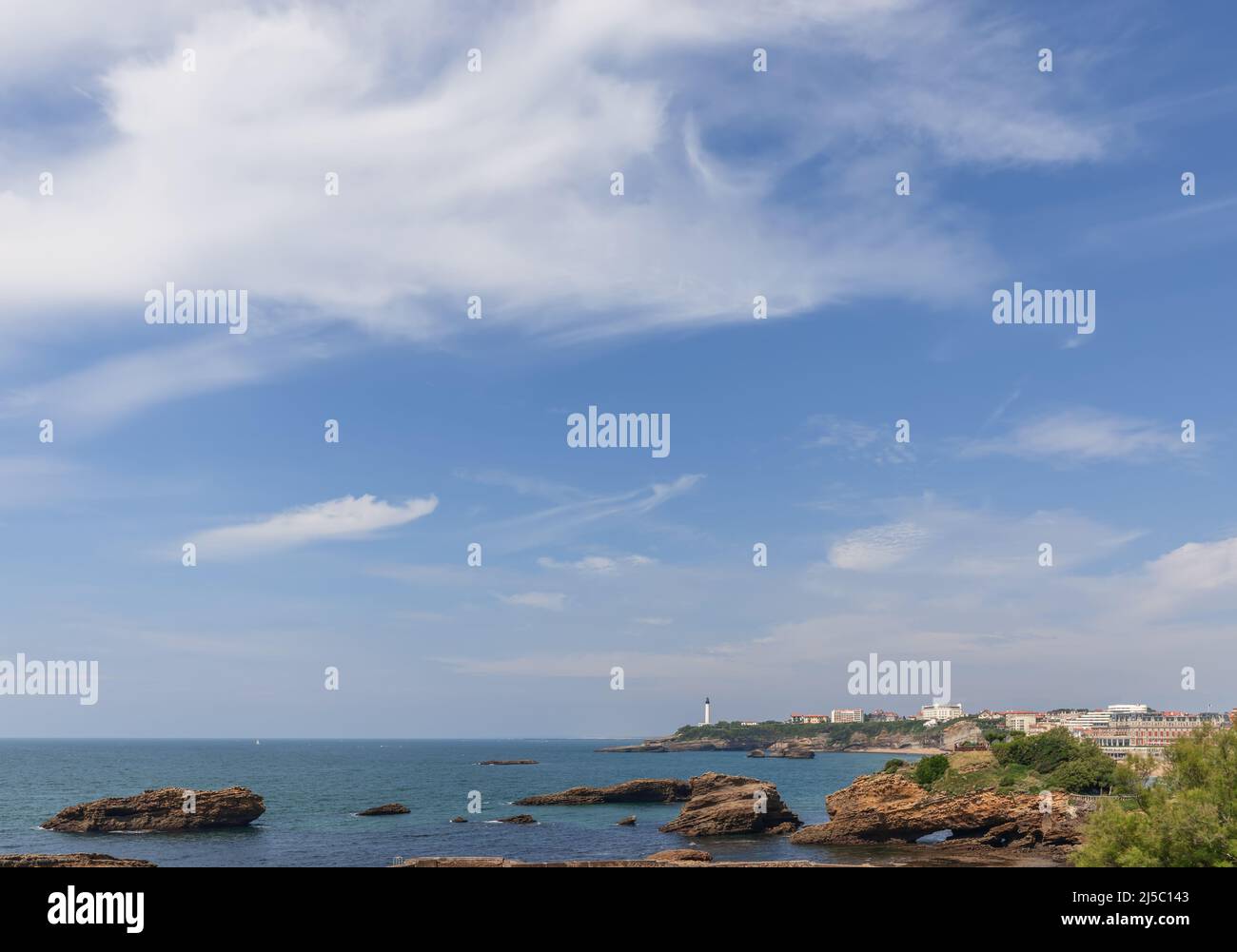 Sea surface of Biscay Bay, rocks formed by it, the Biarritz coastal ...