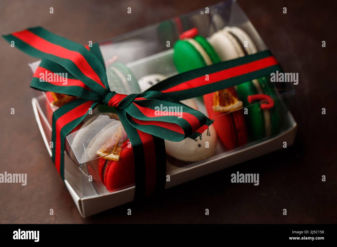 French macarons. Beautiful macaroons with christmas decoration. Stylish ...