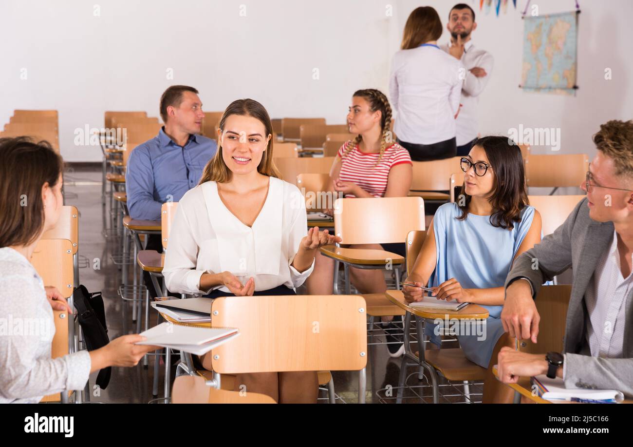 Girl group of students in an auditorium hi-res stock photography and ...