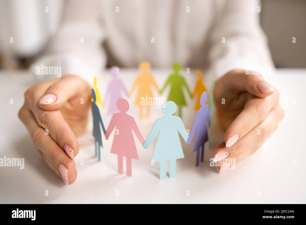 Protecting People Figures. Community Protection And Safety Stock Photo ...