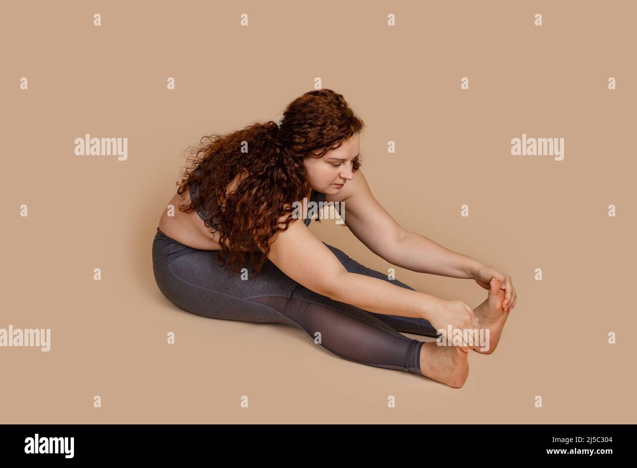Red curly haired melancholy calm fat overweight woman flabs not ...