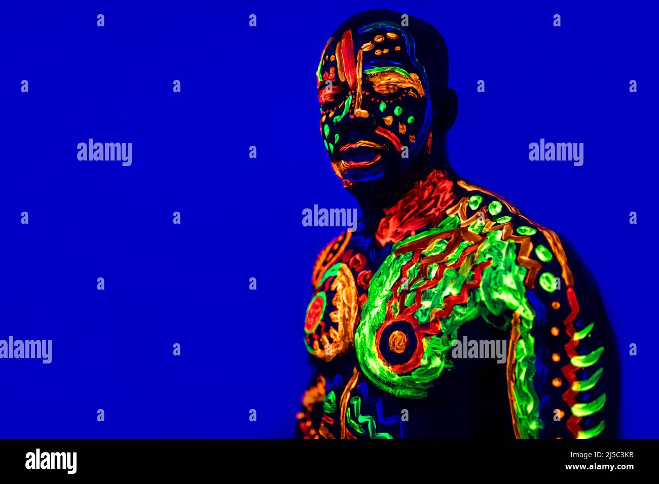 Uv light fluorescent blue man hi-res stock photography and images - Alamy