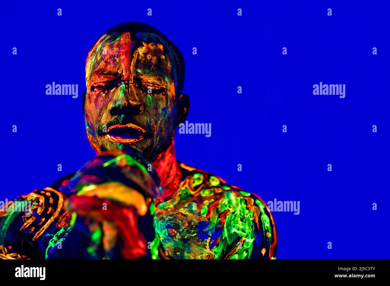 Young man in body paint hi-res stock photography and images - Alamy