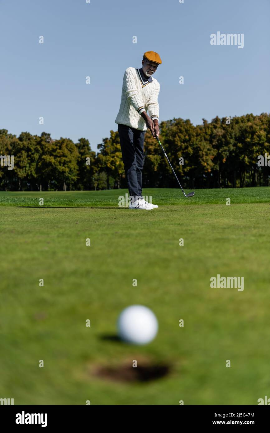 African man playing golf hi-res stock photography and images - Alamy