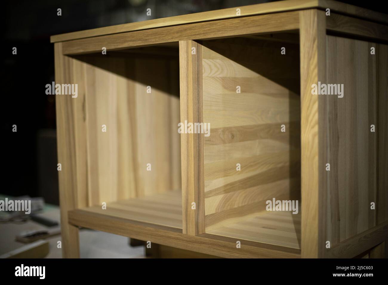 Furniture made of wood in carpentry workshop. Table of boards ...